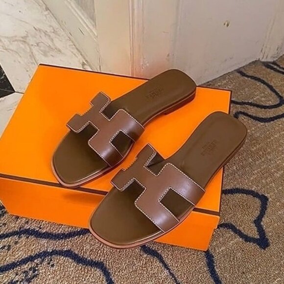 Hermes | Dresses | Herms Oran Sandals Gold Tan Leather H Slides | Poshmark